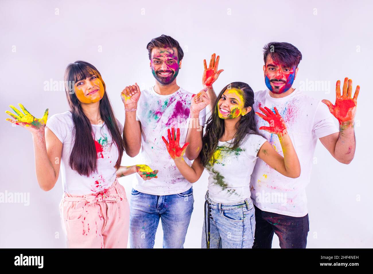 happy teenager friends with colour face and hair feeling good emotions ...