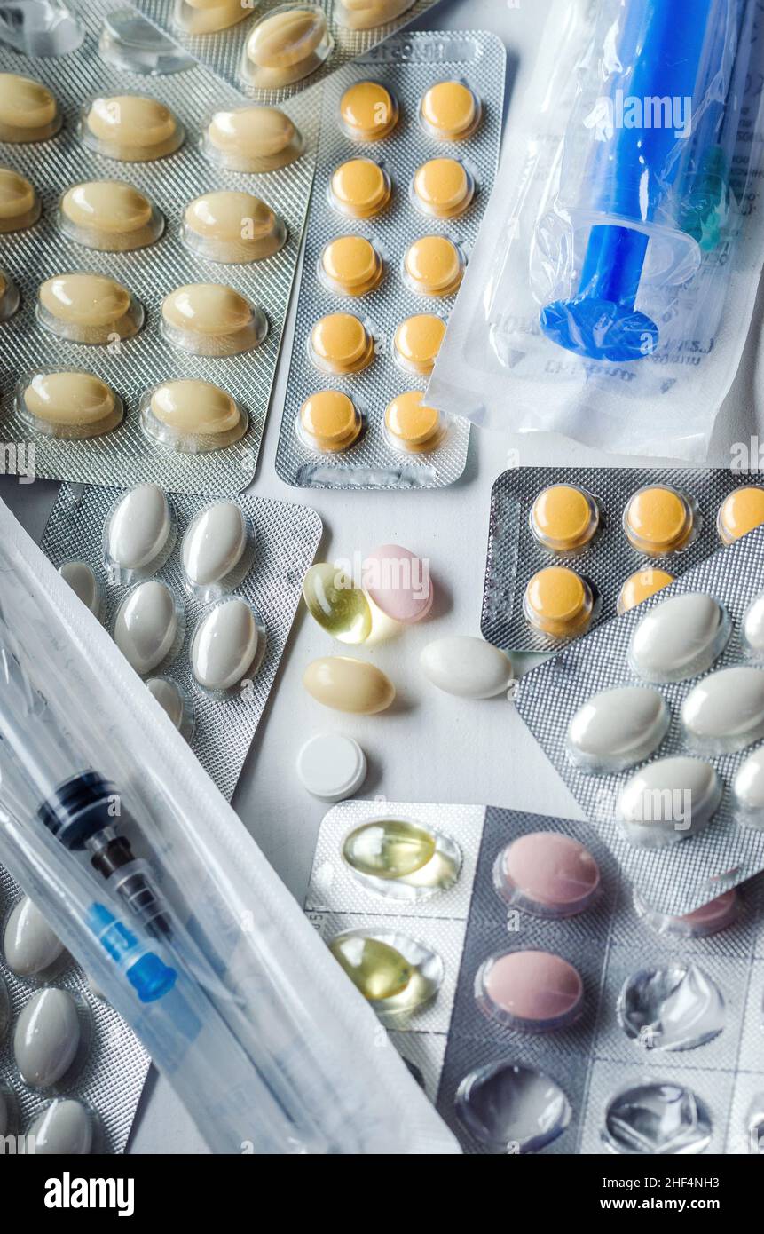 Medical syringes multi colored tablets hi-res stock photography and ...