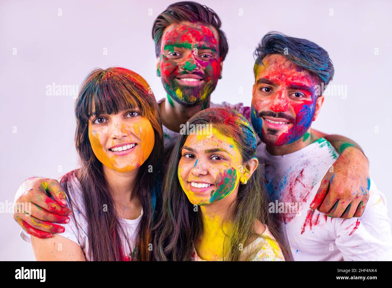 happy teenager friends with colour face and hair feeling good emotions ...