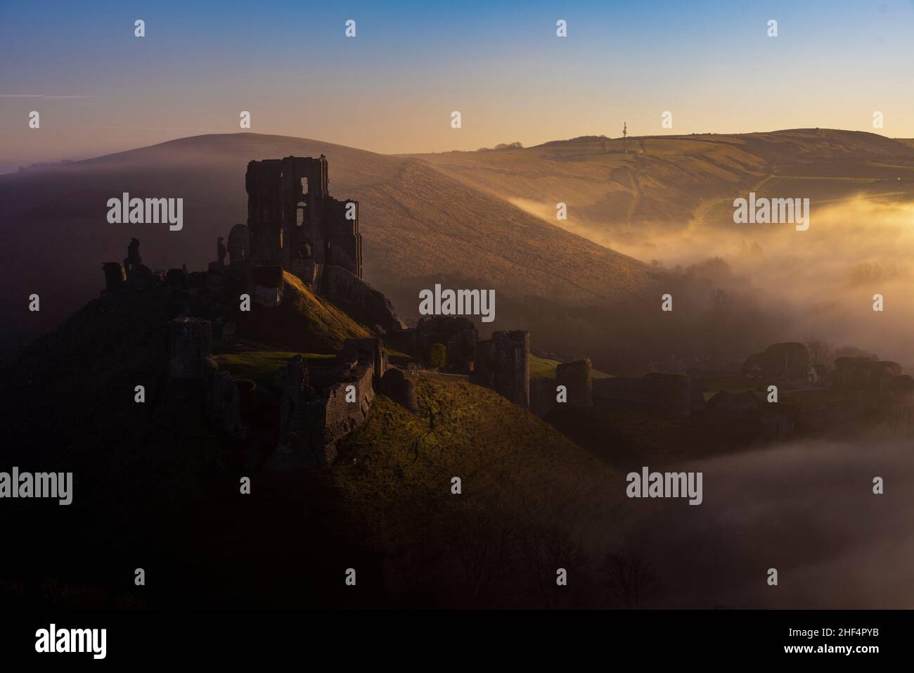 Corfe Castle, UK. 14th Jan, 2022. The view of Corfe Castle surrounded ...