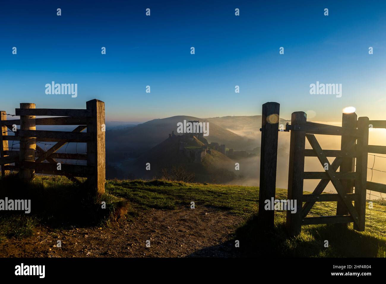 Corfe Castle, UK. 14th Jan, 2022. The view of Corfe Castle surrounded ...
