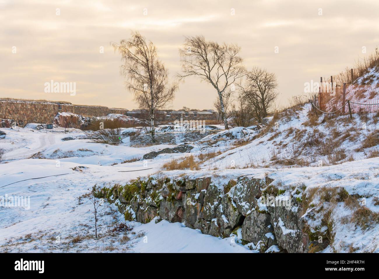 Old stone walls in snowy Suomenlinna fortress island in Helsinki ...
