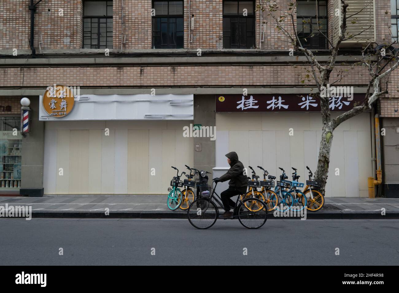 Two shops along the street at 228 Yuyuan Road, listed as a medium-risk ...