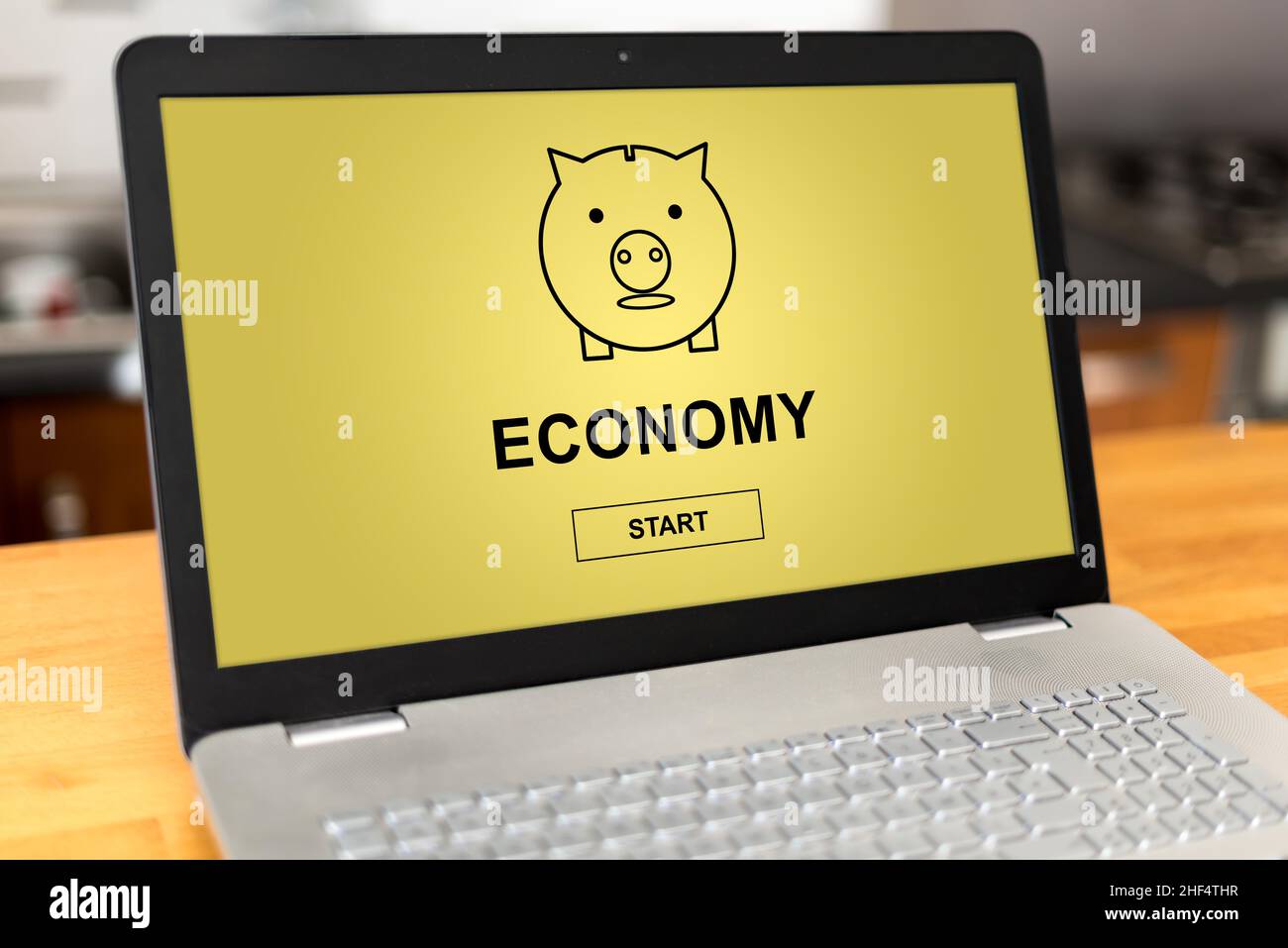Laptop screen with economy concept Stock Photo - Alamy
