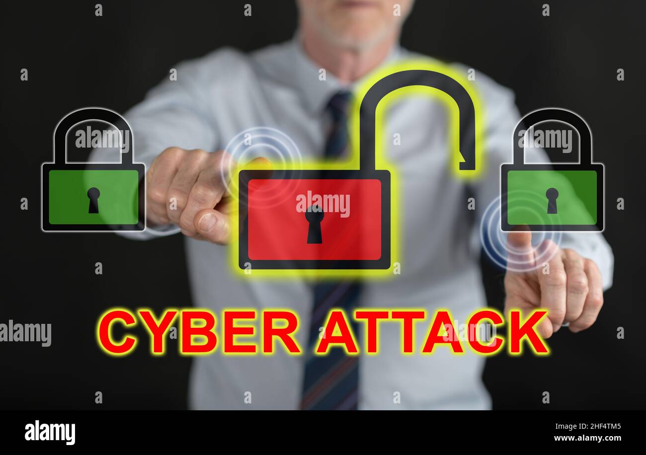 Man touching a cyber attack concept on a touch screen with his finger ...