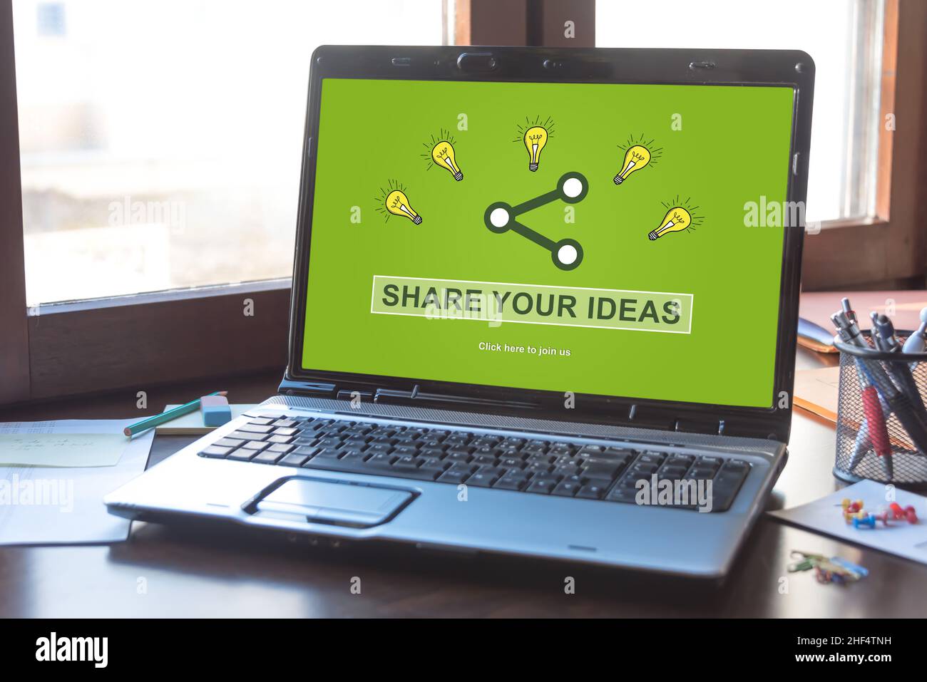 Laptop screen displaying an ideas sharing concept Stock Photo - Alamy