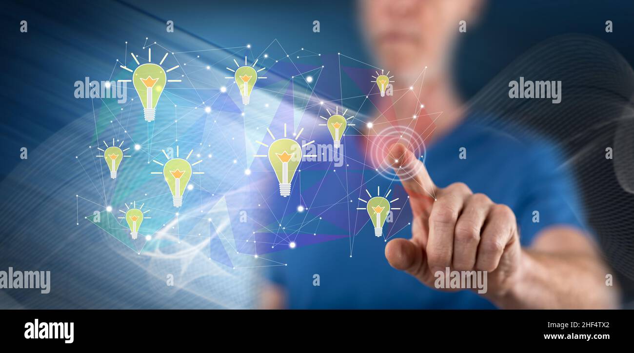 Man touching an innovation concept on a touch screen with his finger ...