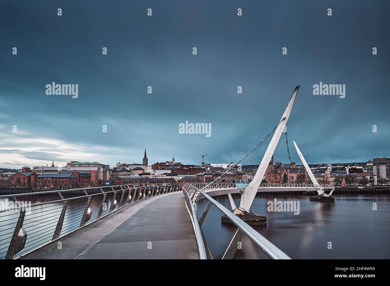 suspension bridge over the river Foyle of Londonderry, Peace Bridge ...