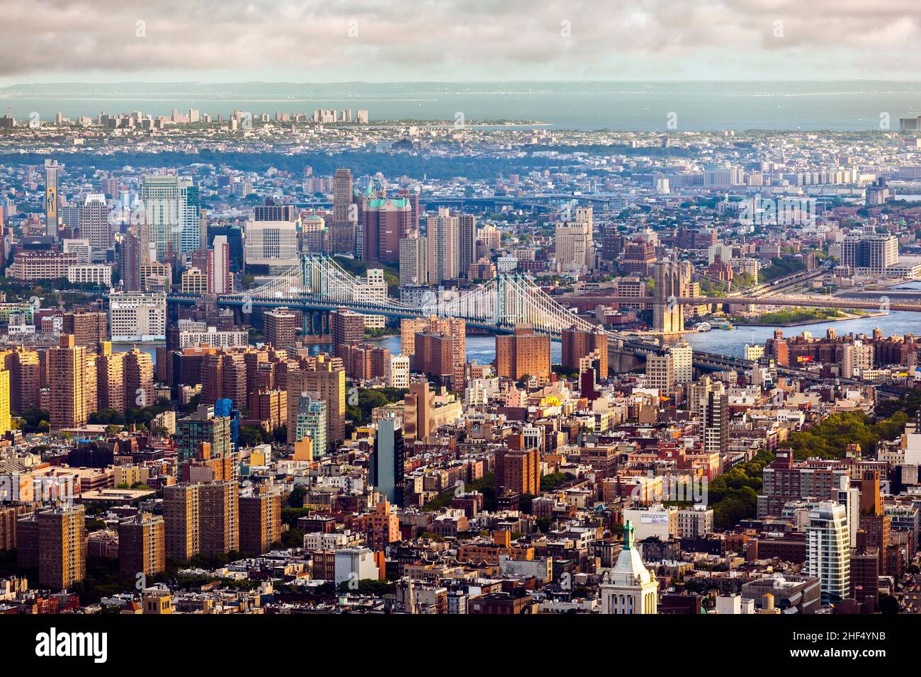 scenic view to Brooklyn bridge over manhattan in sunset Stock Photo - Alamy