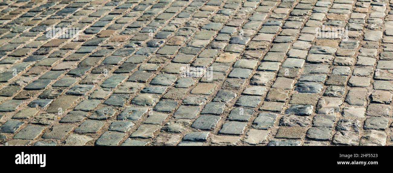 historic old cobbled road as background Stock Photo - Alamy