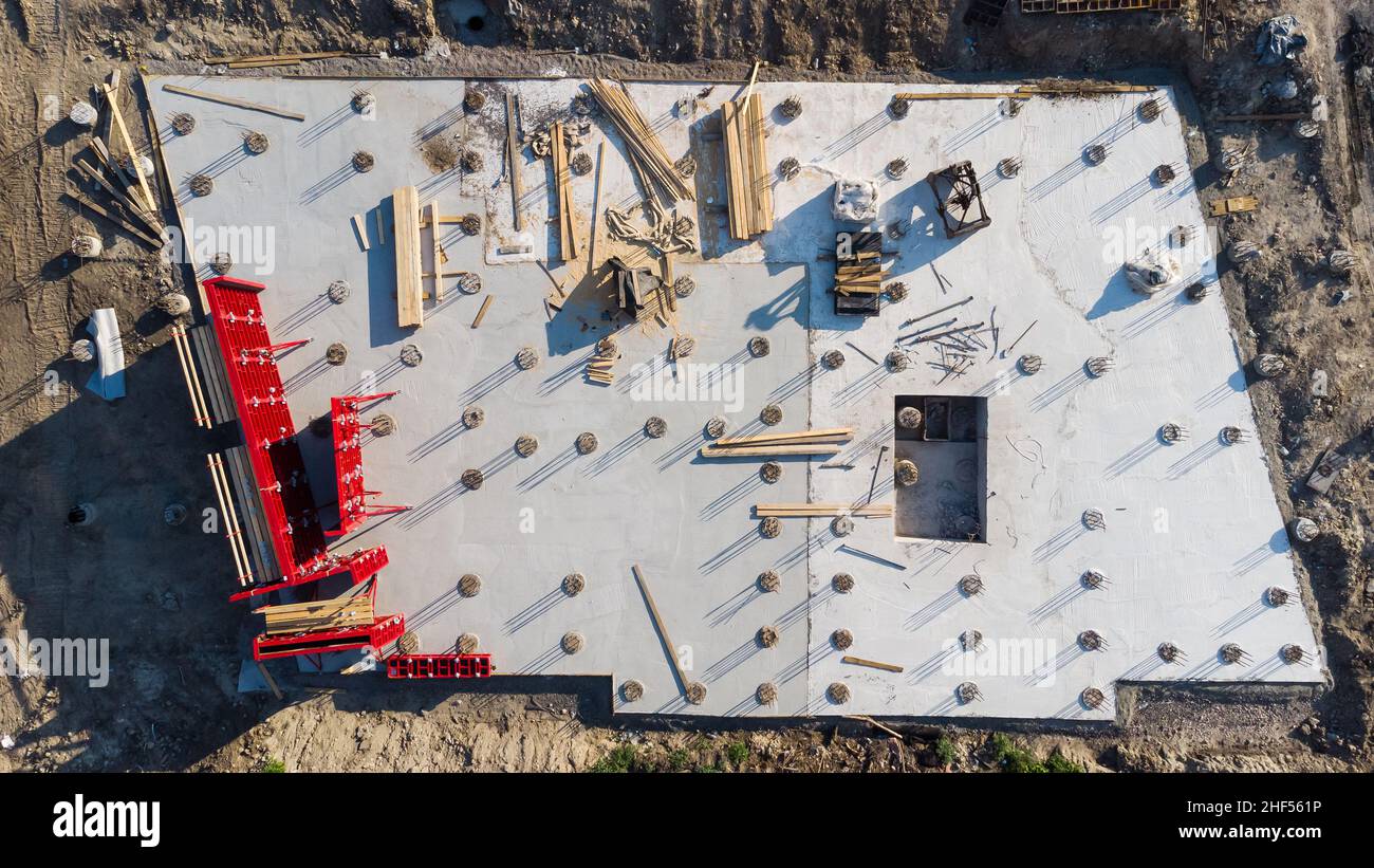 construction machinery on the sports field. construction of athletic ...