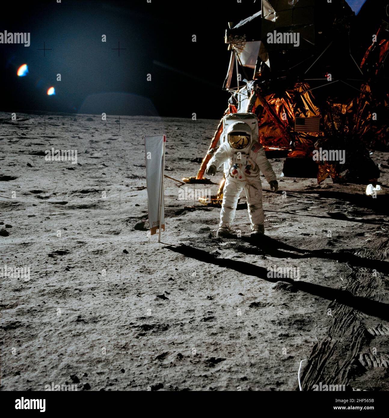 Astronaut Edwin E. Aldrin, Lunar Module (LM) pilot, stands beside the ...