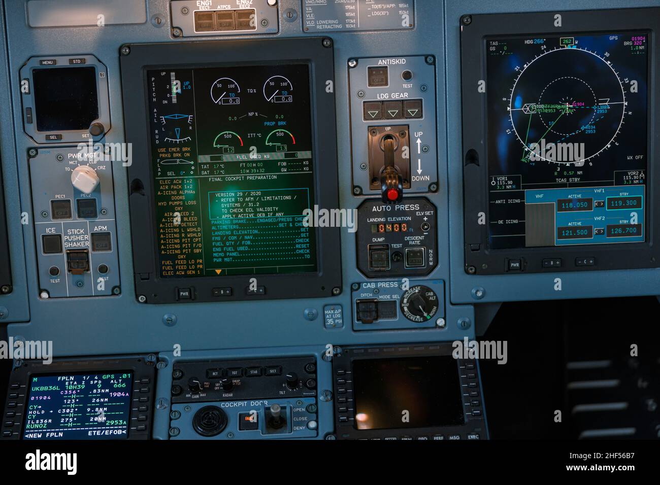Airplane cockpit with control panel, dashboard and flight displays ...