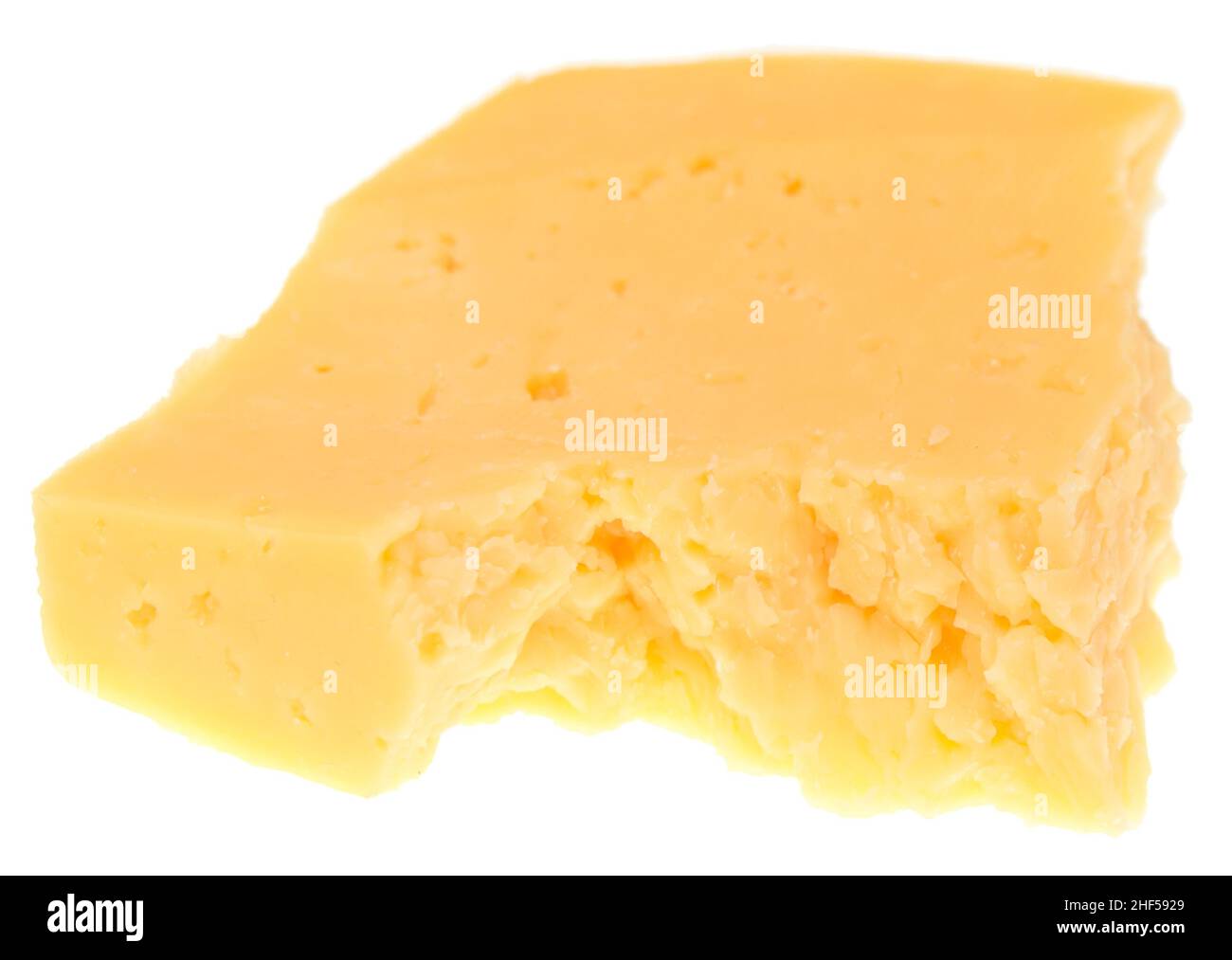 Broken cheese isolated on white background Stock Photo - Alamy