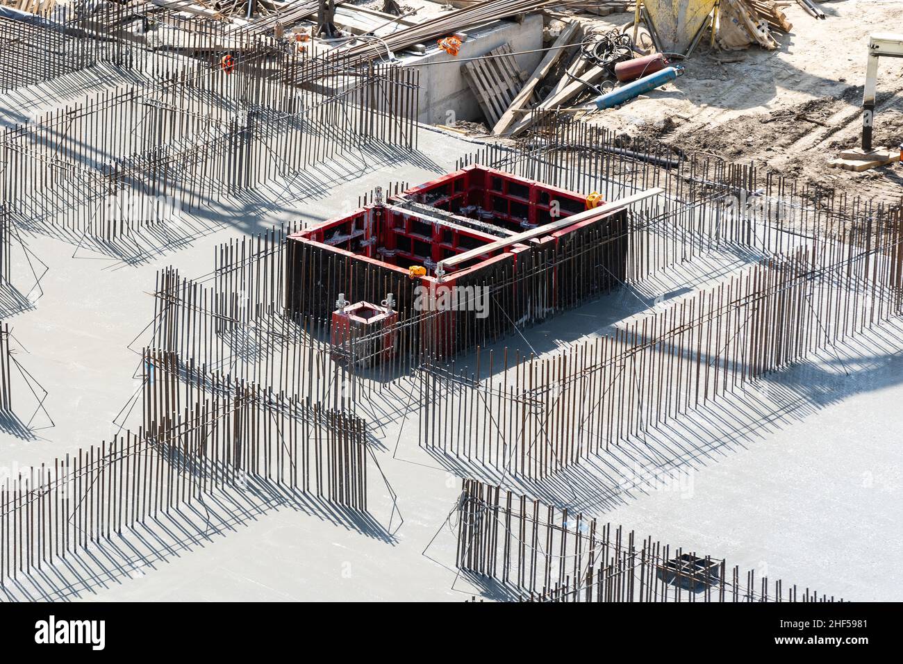Closeup of house foundation made from concrete shuttering blocks filled ...