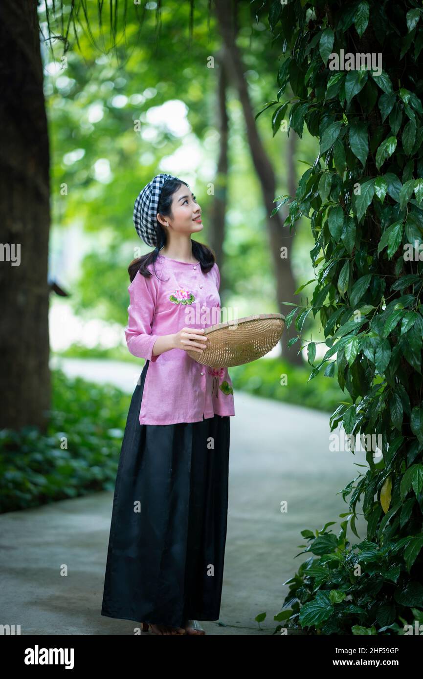 Ho Chi Minh city, Viet Nam: Traditional costume of a Vietnamese girl in ...