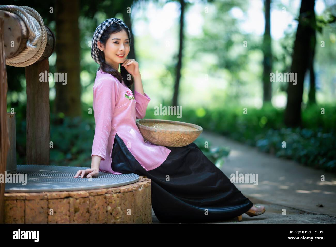 Ho Chi Minh city, Viet Nam: Traditional costume of a Vietnamese girl in ...