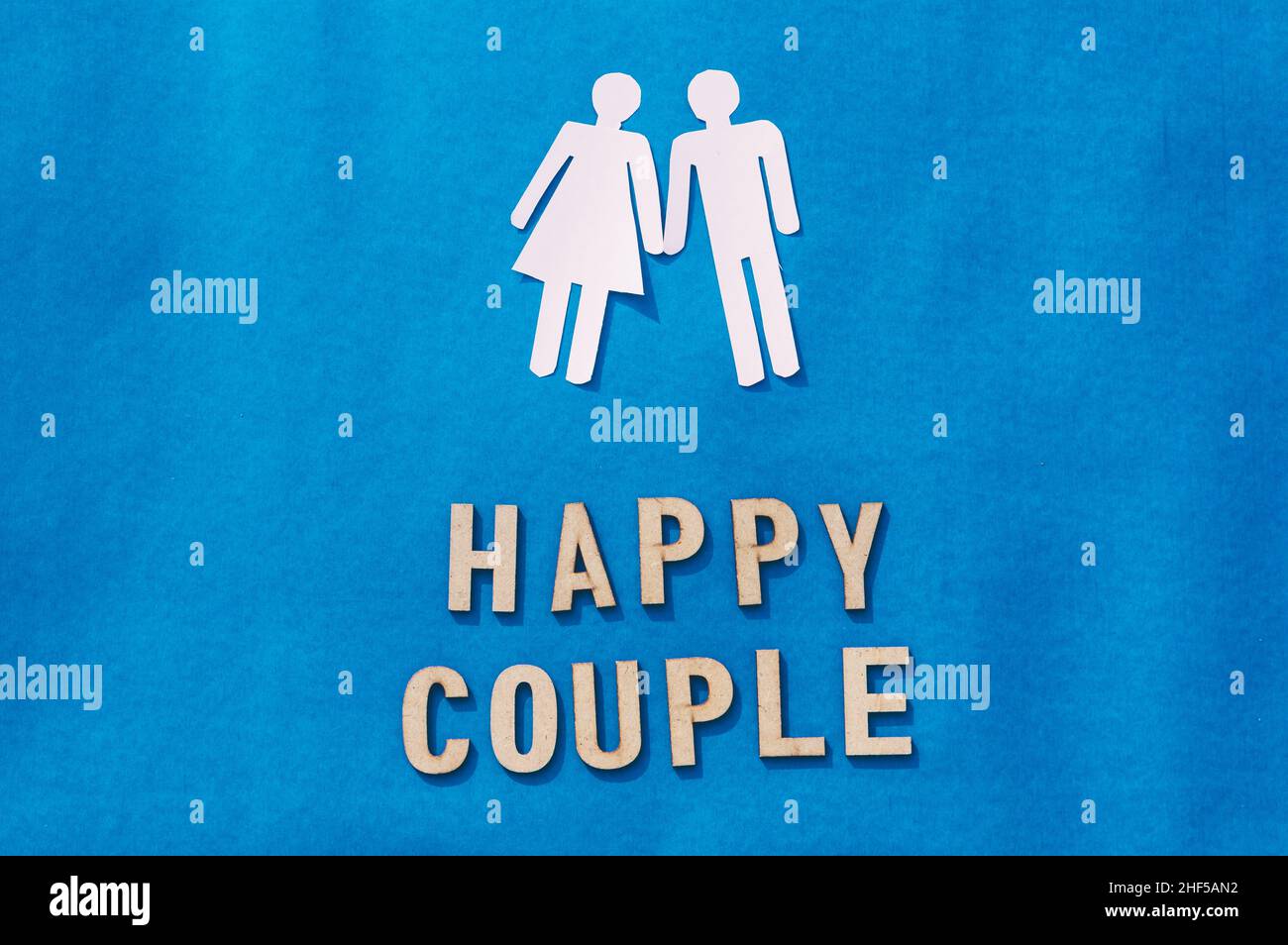 Happy Human Couple Paper Craft Mockup on Blue background. Origami ...