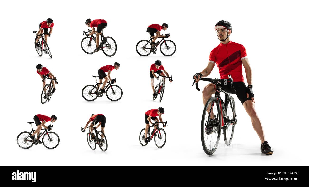 Professional male bike rider on road bike in motion isolated over white ...