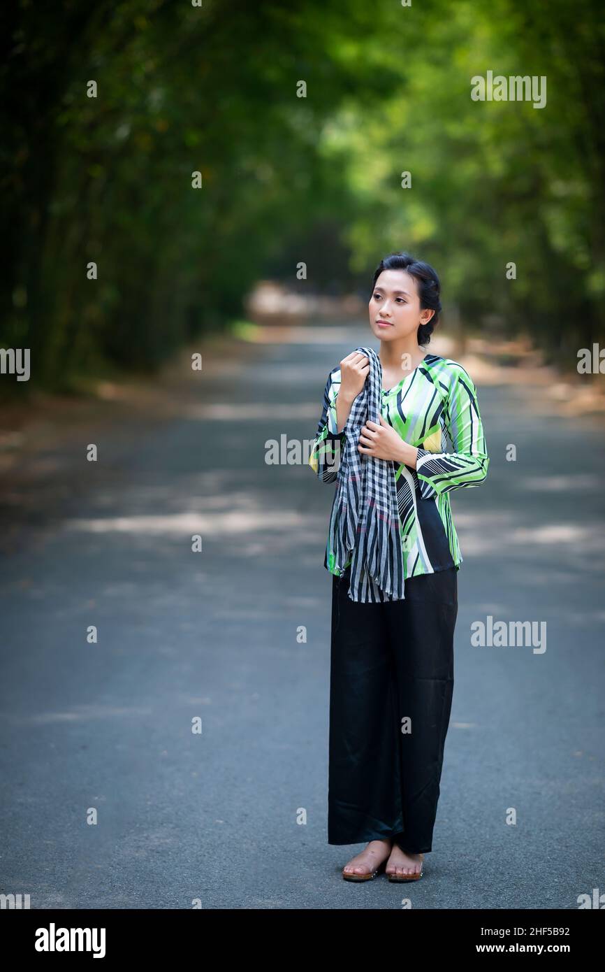 Ho Chi Minh city, Viet Nam: Traditional costume of a Vietnamese girl in ...