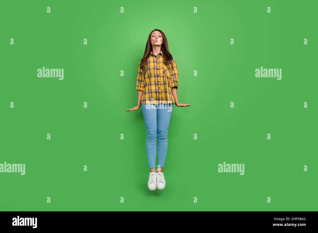 Full length photo of adorable young lady kiss lips look camera have ...