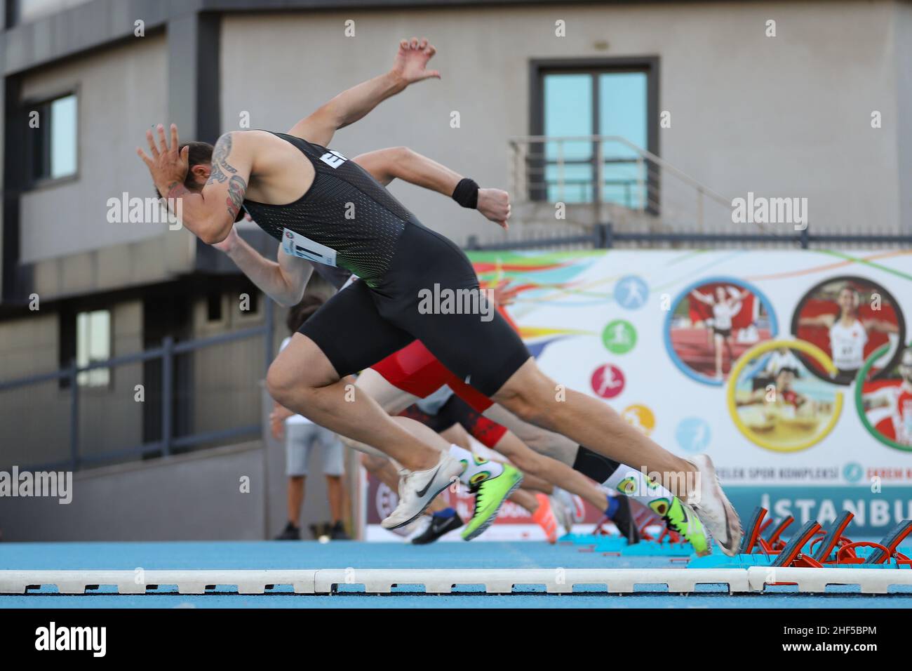ISTANBUL, TURKEY - AUGUST 07, 2021: Athletes running 100 metres during ...