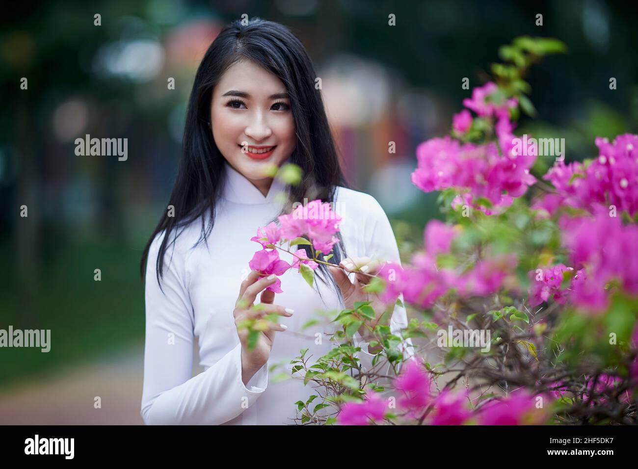 Ho Chi Minh City, Vietnam: Portrait women in white ao dai Vietnam, The ...