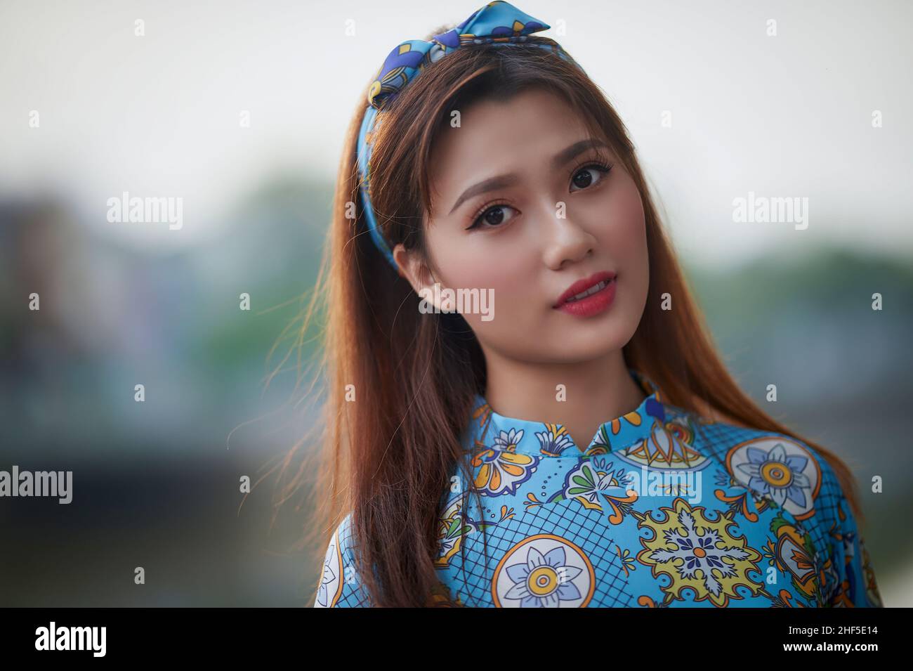 Ho Chi Minh city, Viet Nam: Ao Dai, Beautiful girl in Vietnamese traditional costume Stock Photo ...