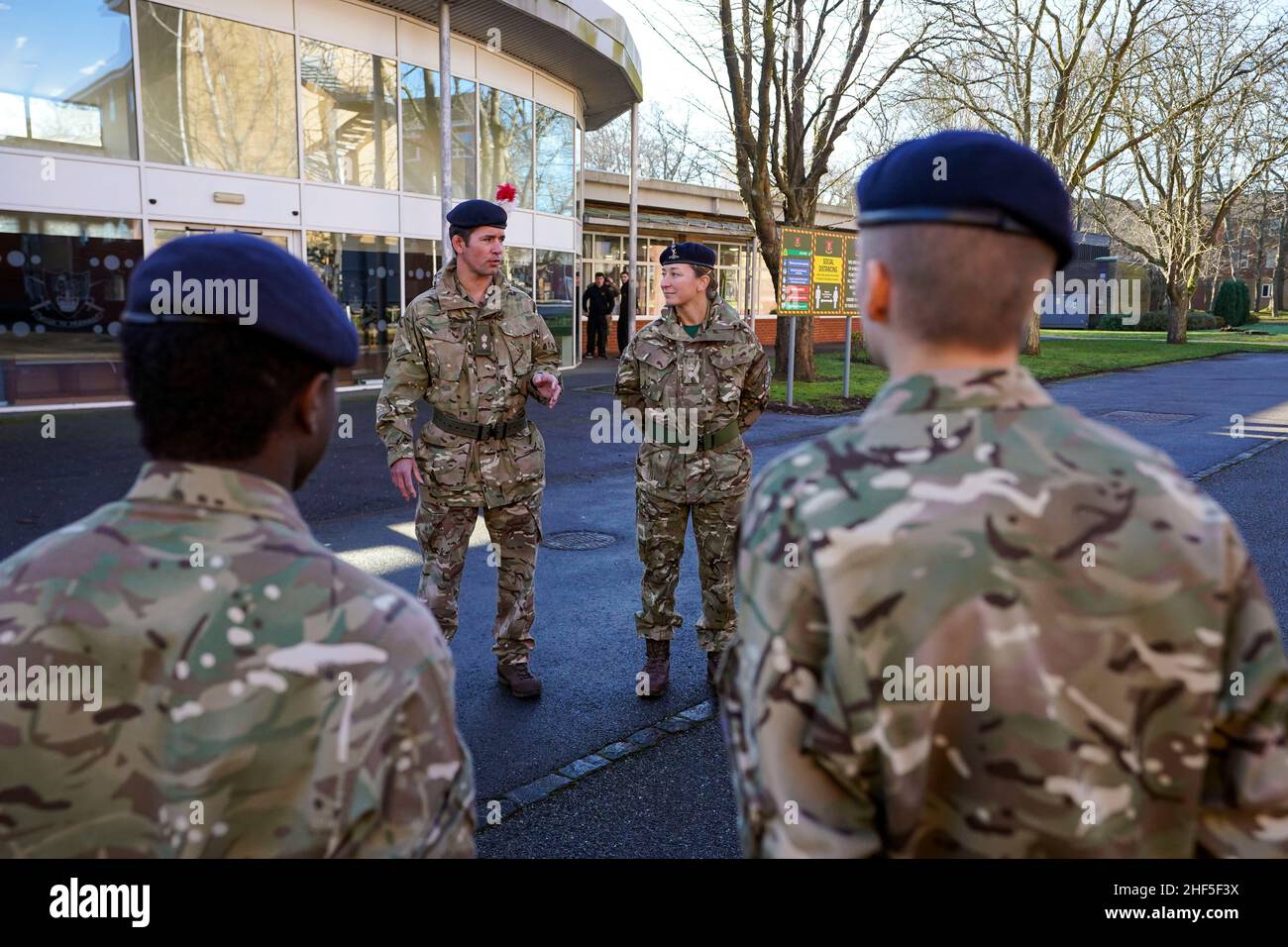 Lt Col Shamus Kelly and his wife, Lt Col Lyndsey Kelly talk to soldiers ...