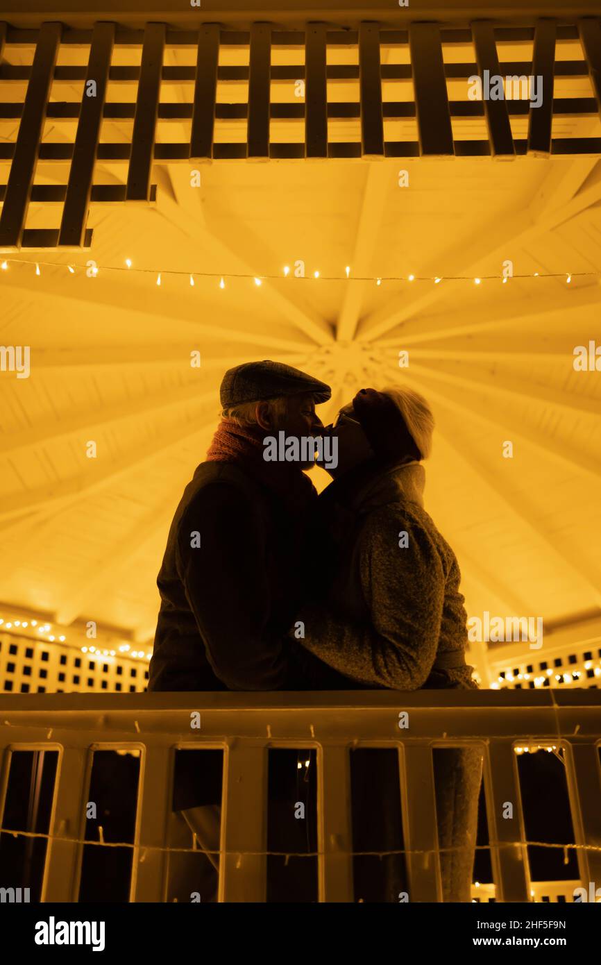 Romantic atmosphere and kiss of a couple in love Stock Photo - Alamy