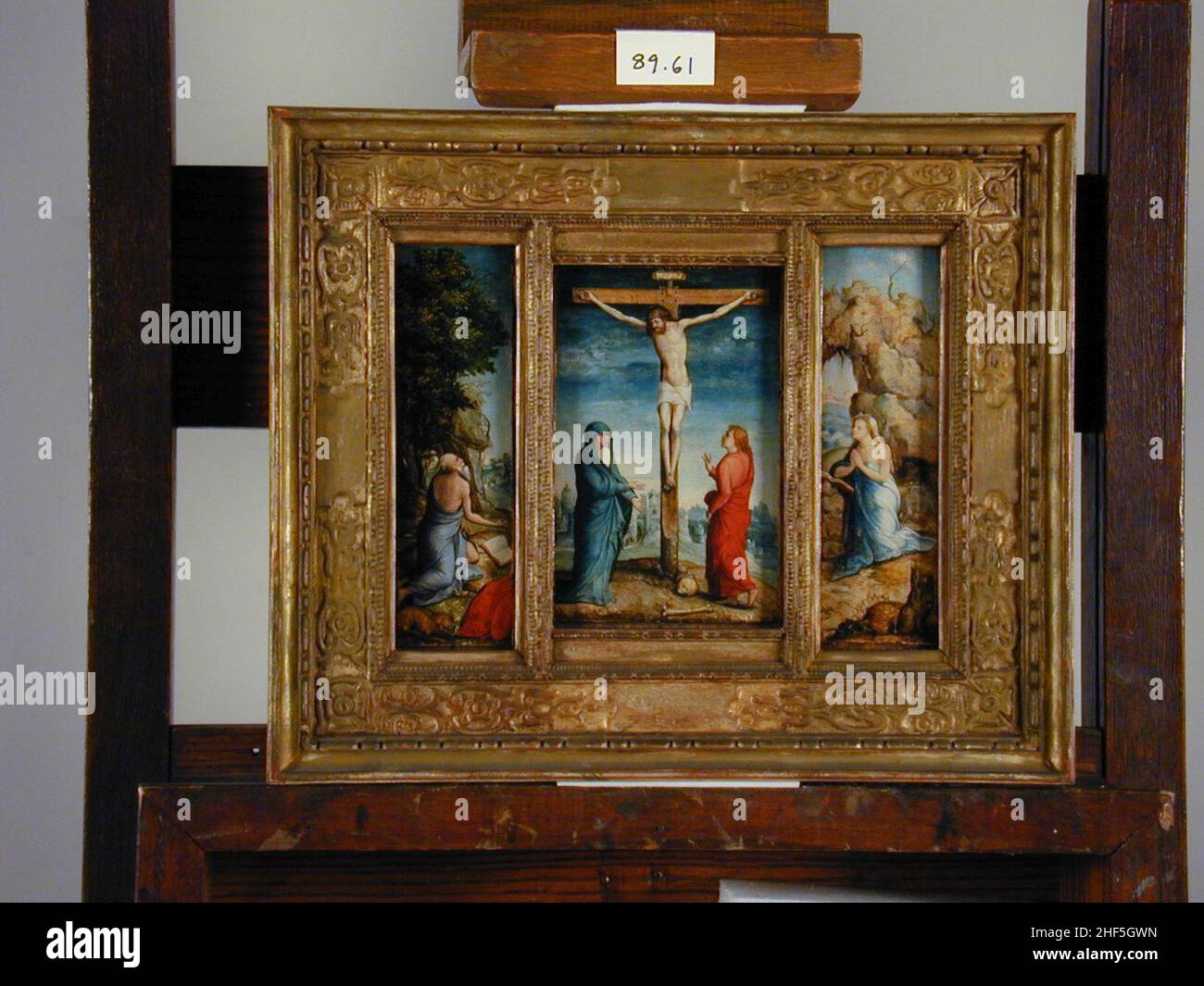 School of Flanders - Crucifixion, St. Jerome, St. Mary Magdalene Stock Photo - Alamy