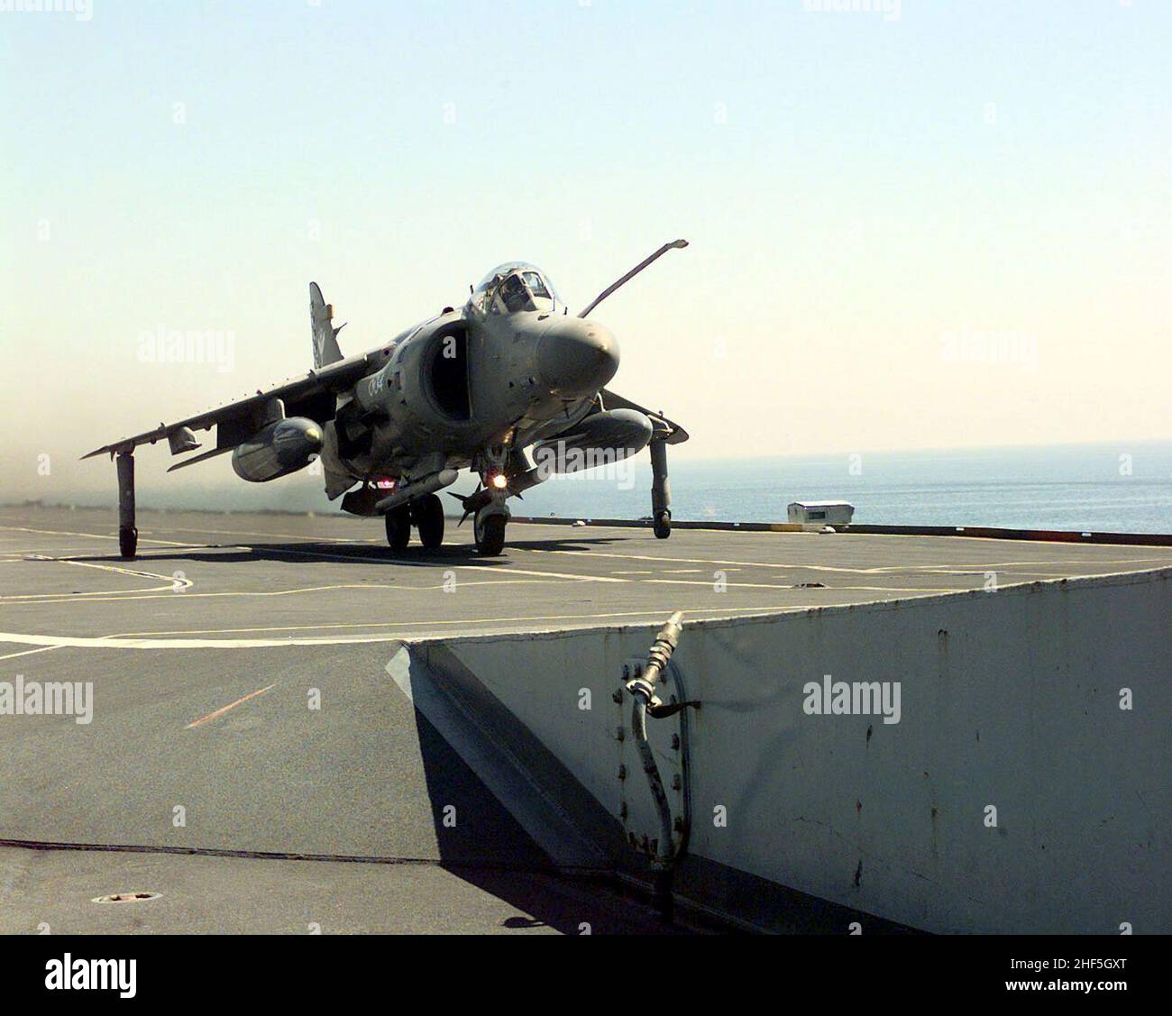 Sea Harrier 801 NAS taking off HMS Illustrious (R06) 1998 Stock Photo ...