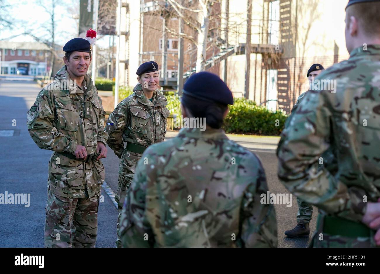 Lt Col Shamus Kelly and his wife, Lt Col Lyndsey Kelly talk to soldiers ...