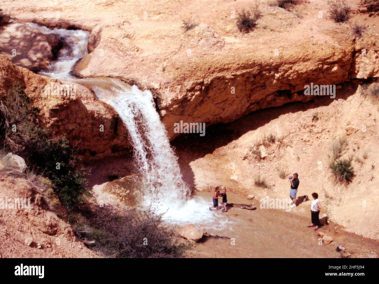 Scenic Byway 12 - Wading in the Tropic Creek Waterfall Stock Photo - Alamy