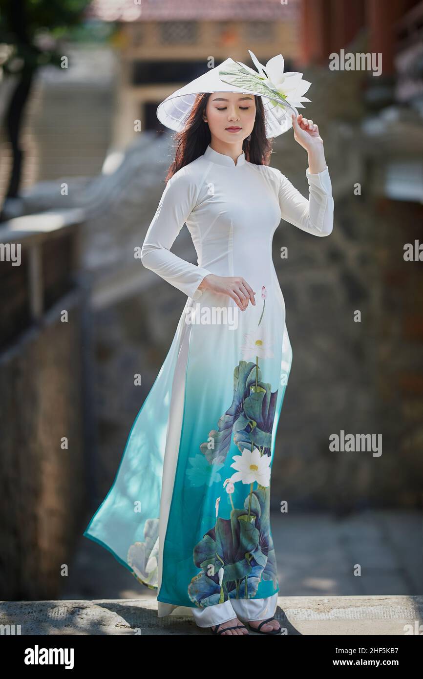 Ho Chi Minh city, Viet Nam: Ao Dai, Beautiful girl in Vietnamese traditional costume Stock Photo ...