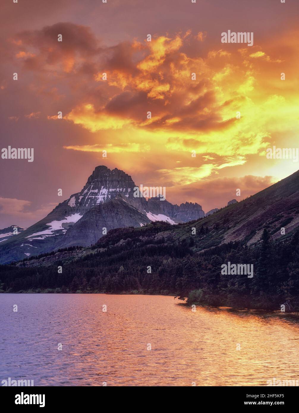 Sunset on Swiftcurrent Lake with Mount Wilbur. Glacier National Park ...