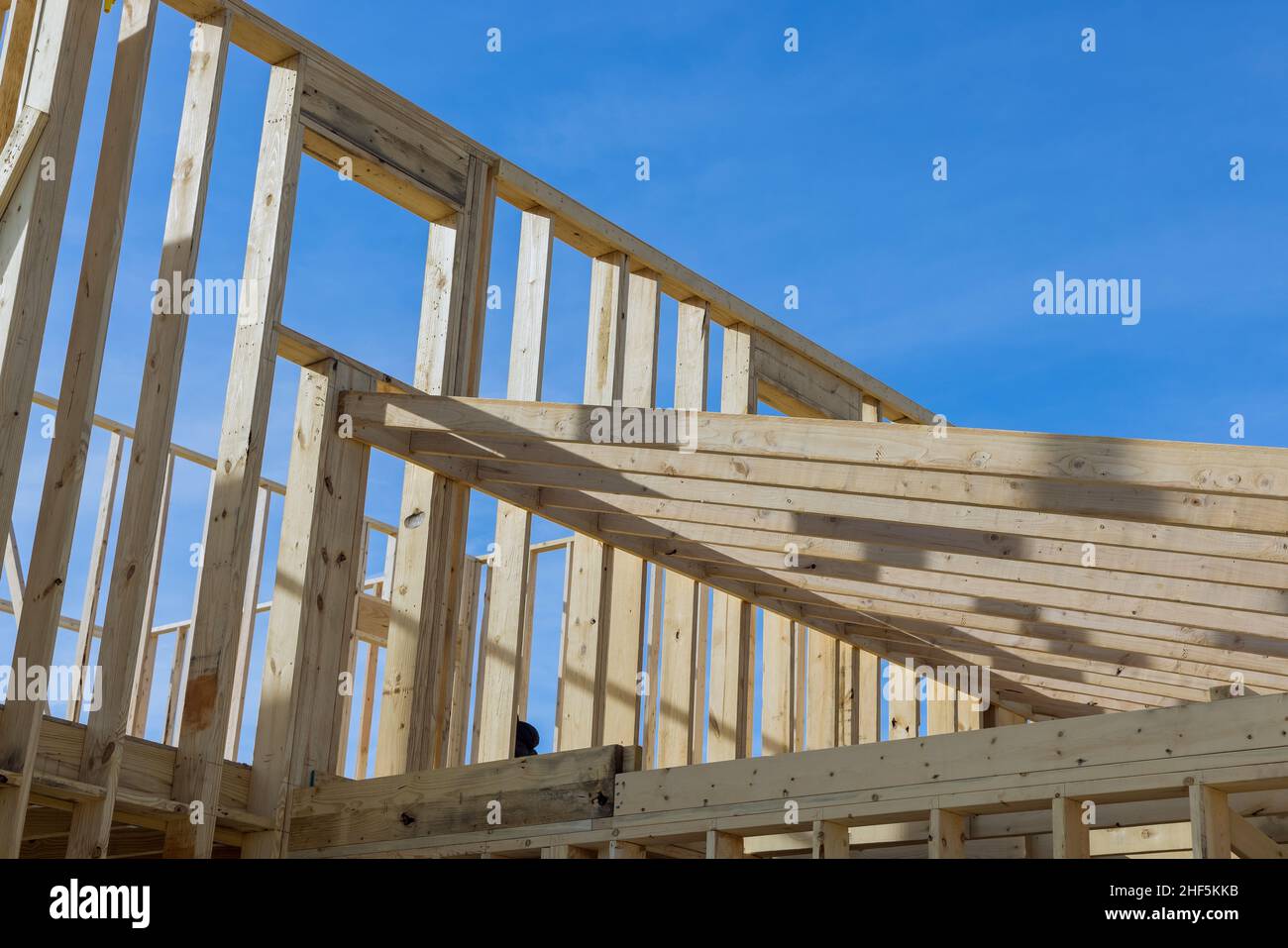 Wood building frame structure on a new development Stock Photo - Alamy