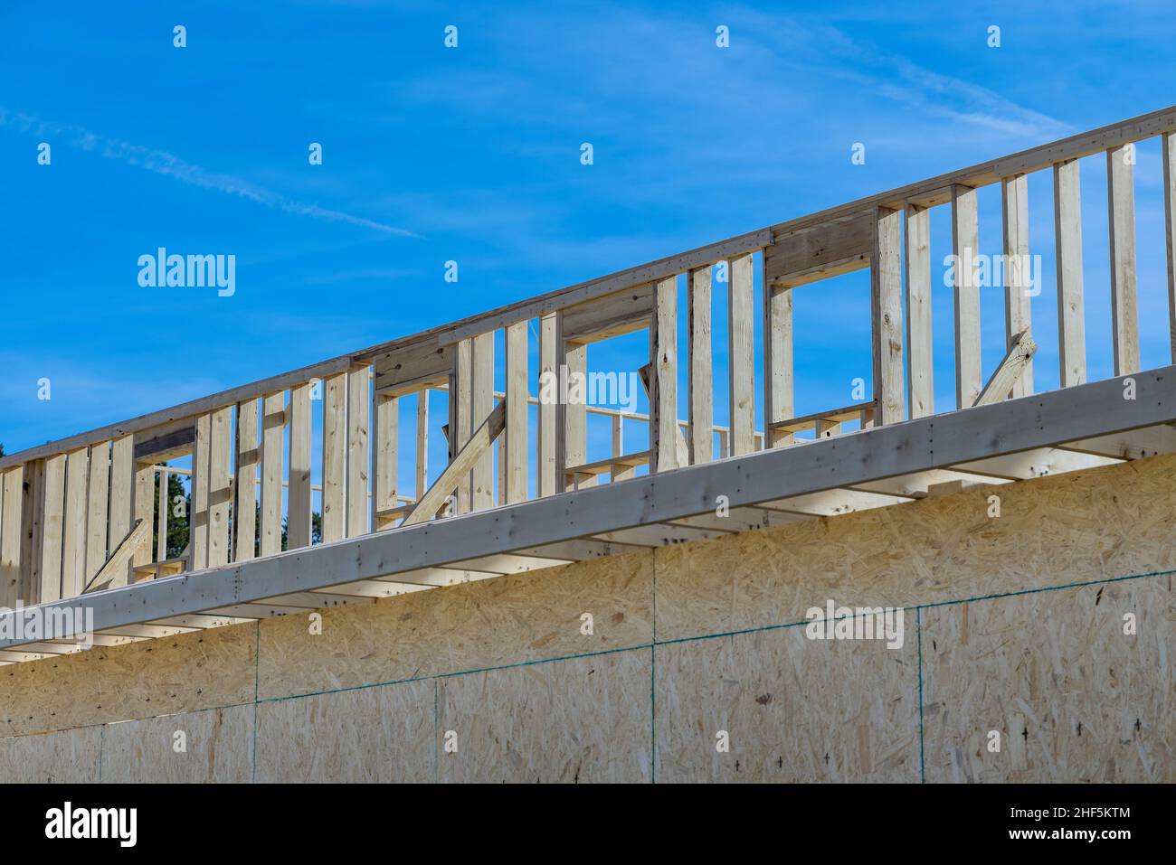 Wooden house in American beams the view of frame structure on a new ...