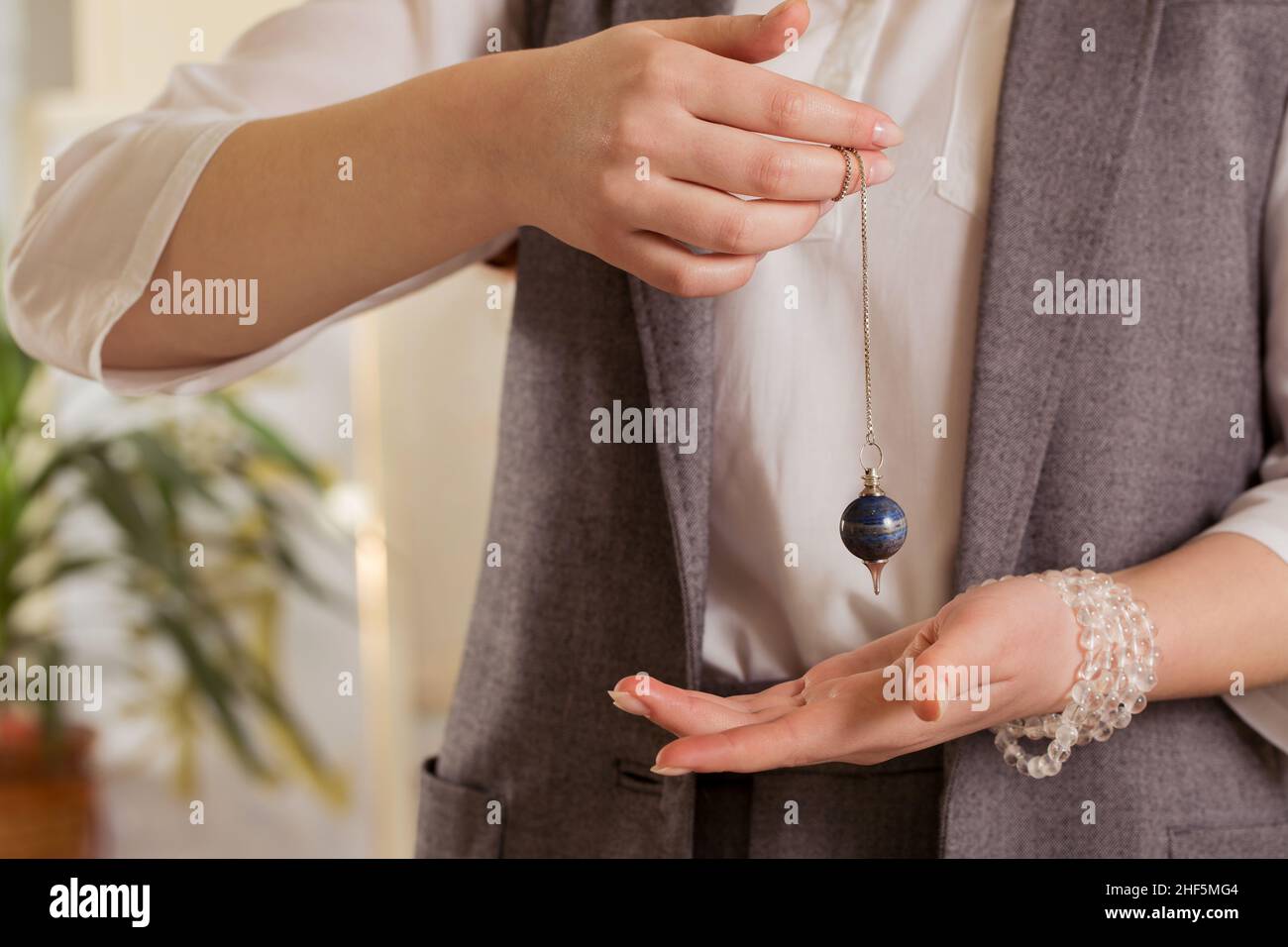 Crystal pendulum hi-res stock photography and images - Alamy