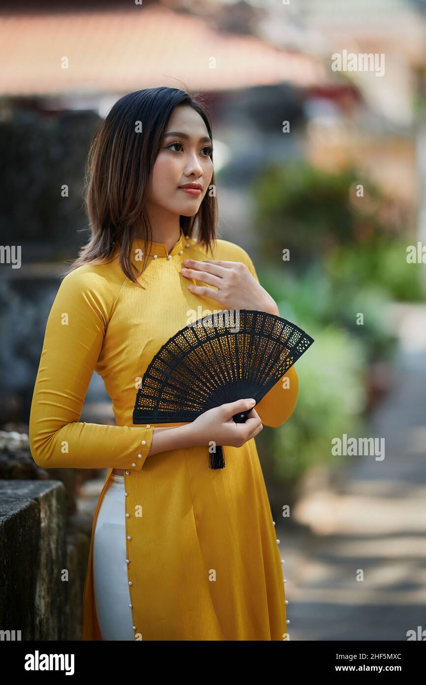 Ho Chi Minh city, Viet Nam: Ao Dai, Beautiful girl in Vietnamese traditional costume Stock Photo ...