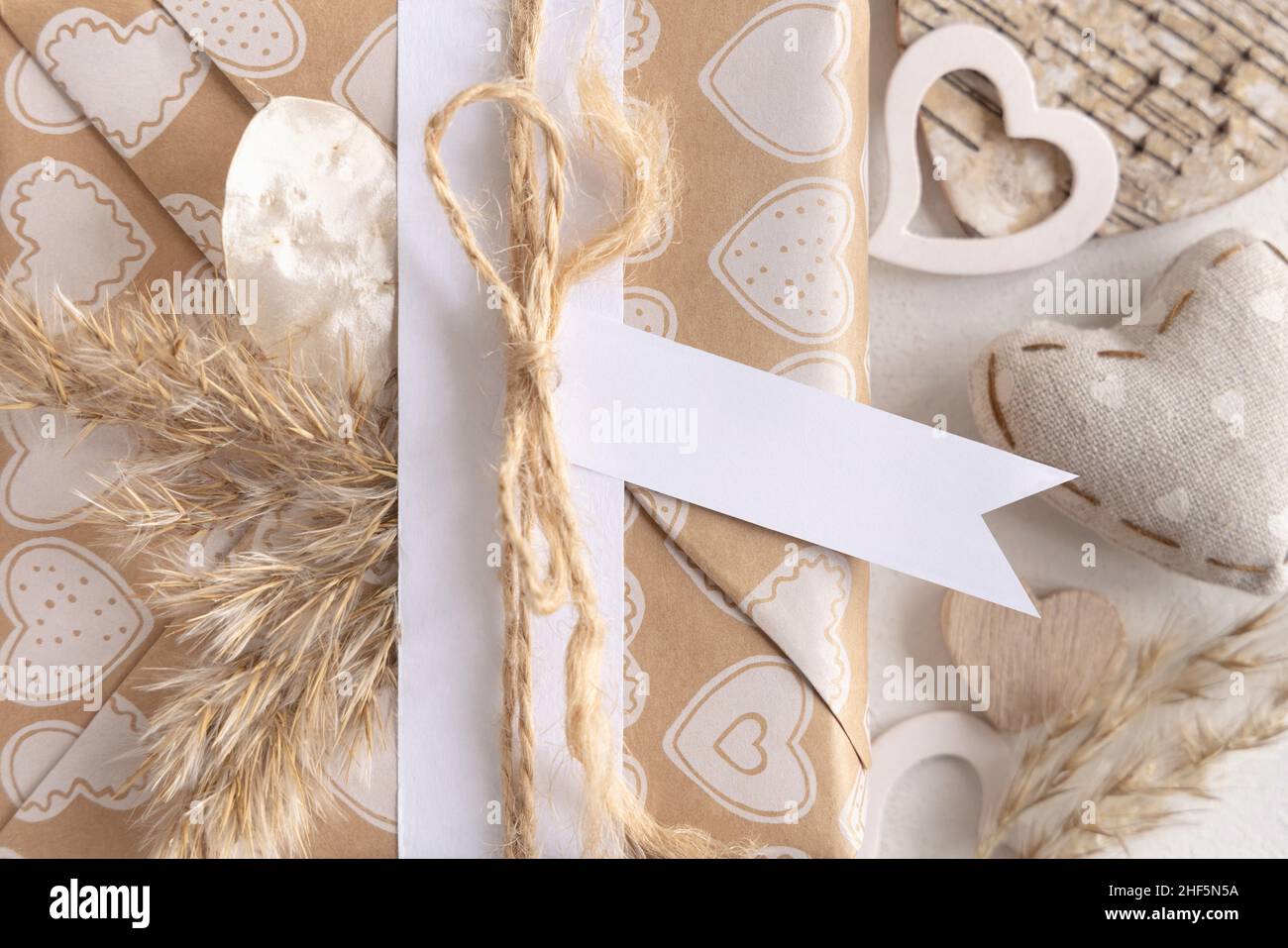 Valentines present with horizontal gift tag, heart and pampas grass ...