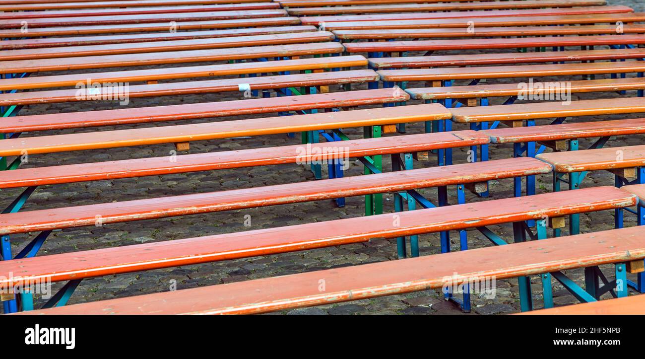 hinged benches made of wood at the floor Stock Photo - Alamy