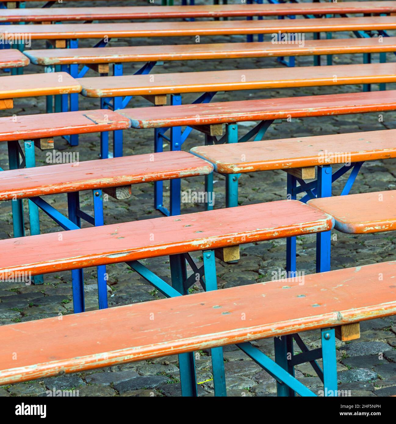 hinged benches made of wood at the floor Stock Photo - Alamy