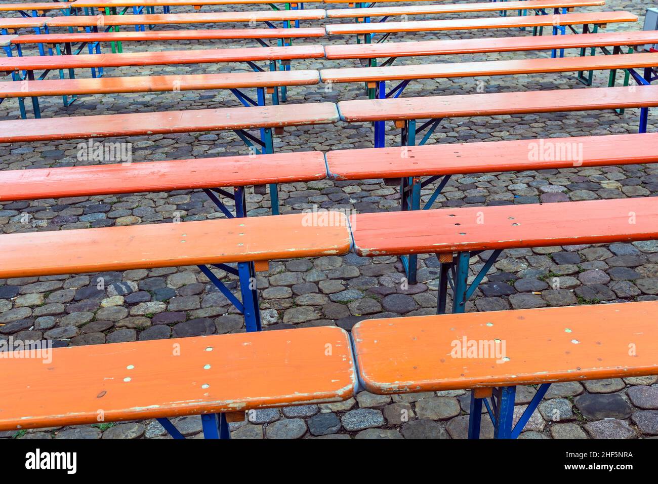 hinged benches made of wood at the floor Stock Photo - Alamy