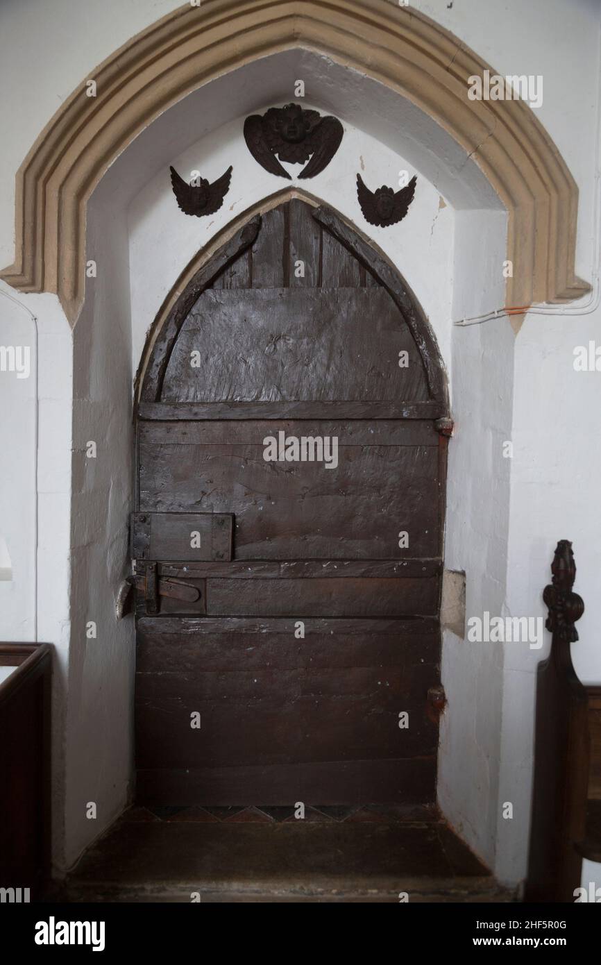 Ancient wooden door inside Yaxley church, Suffolk, England, UK Stock ...