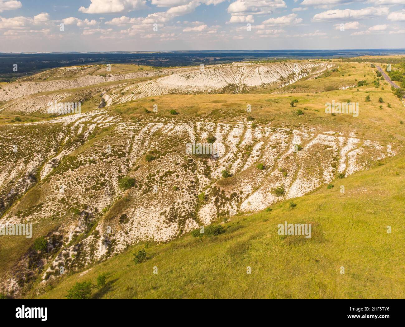 ancient multimillion chalk mountains on the steppe surface of the earth ...