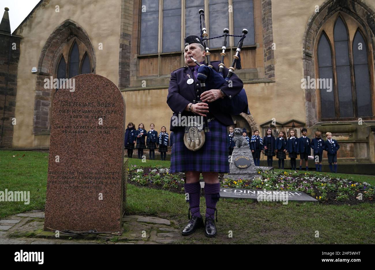 Piper Jennifer Hutcheon plays during the ceremony to mark 150th ...