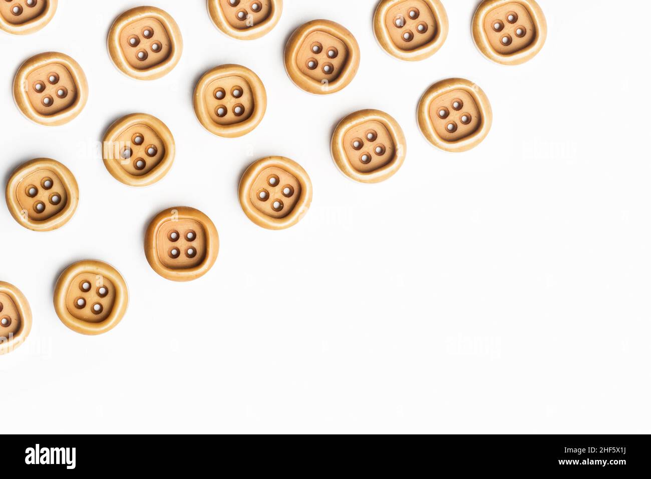 Brown buttons isolated on a white background with copy space Stock ...