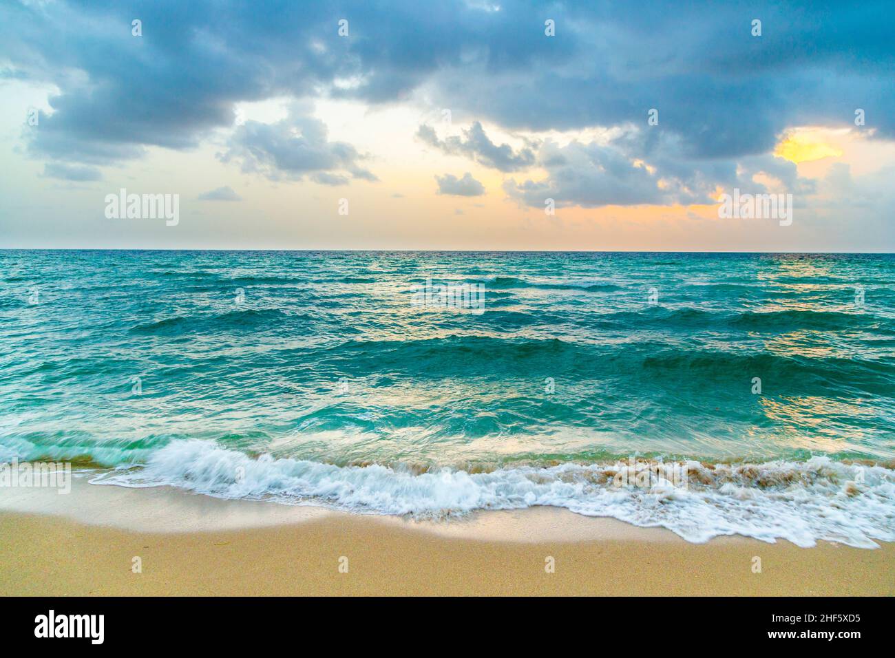 sea waves in Miami witzh cloudy sky in bad weather Stock Photo - Alamy