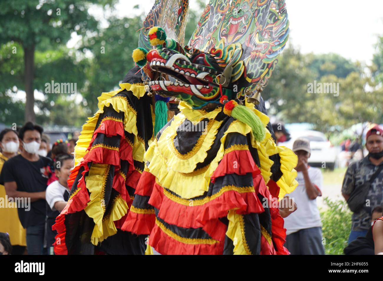 The artist performing Jaranan music dancers and playing a traditional ...